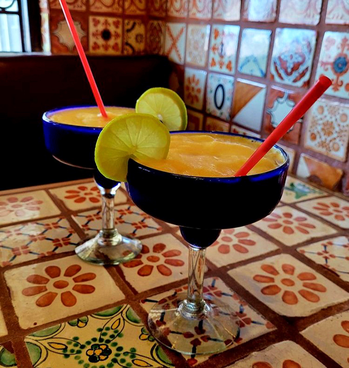 Mango margaritas that taste like vacation in a glass. These sunny concoctions are what happens when fruit and tequila decide to throw a party.