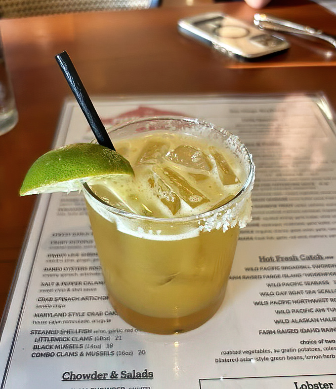 A proper margarita with salt rim and lime &ndash; because sometimes the perfect seafood companion isn't wine but tequila's citrusy dance partner.