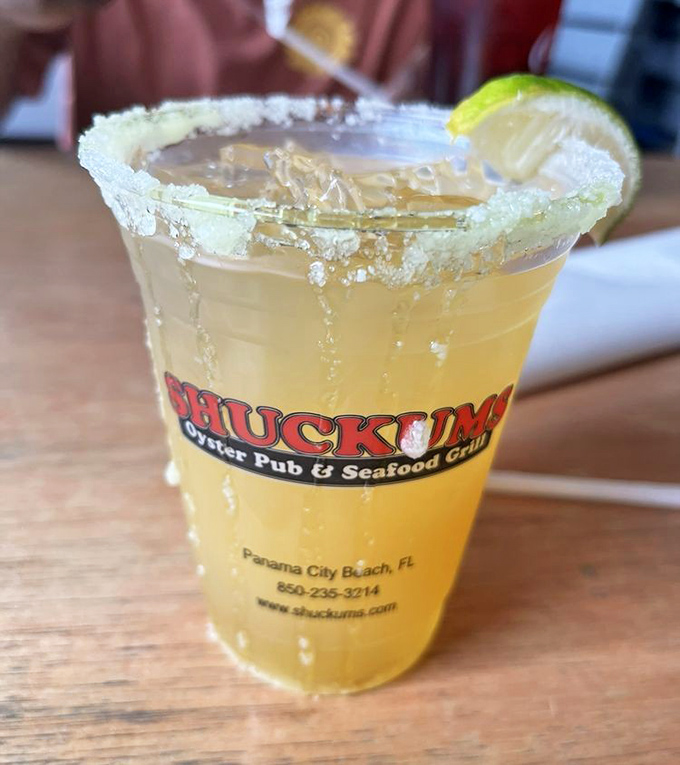 A proper margarita with salt-crusted rim and lime&mdash;because sometimes the perfect seafood companion isn't more seafood, but tequila's sunny disposition.