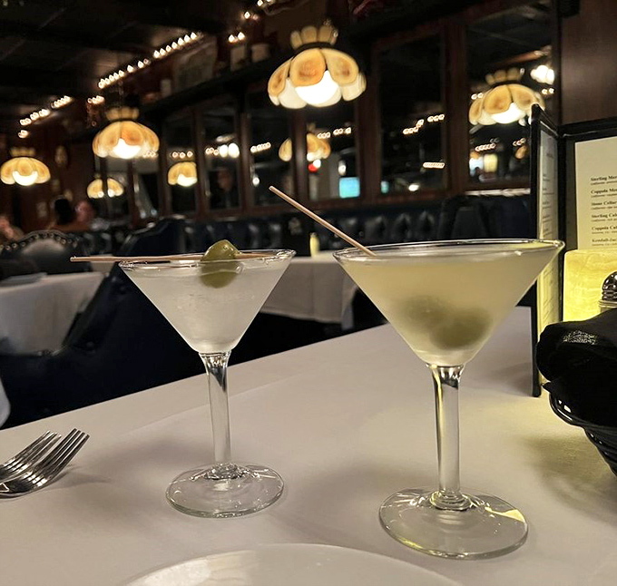 Ice-cold martinis waiting to complement a perfect steak dinner. James Bond would approve of these crystal-clear classics with their plump olives.