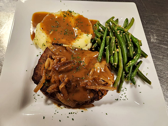 Comfort food royalty: meatloaf with gravy and green beans that would make your grandmother simultaneously proud and jealous.