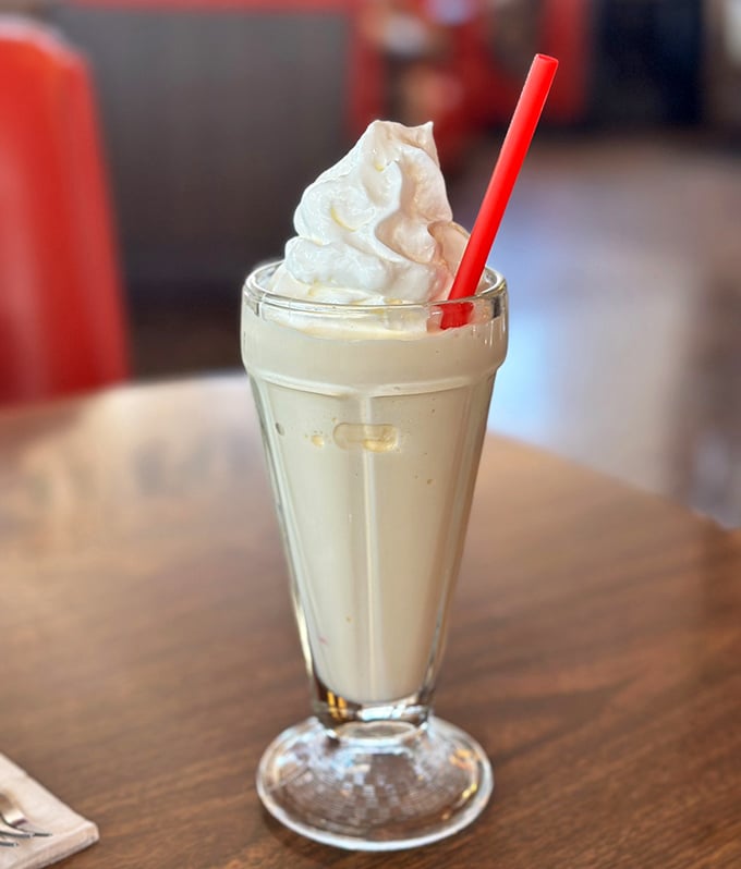 A milkshake thick enough to require serious straw commitment. This isn't a drink; it's dessert in disguise wearing a whipped cream hat.
