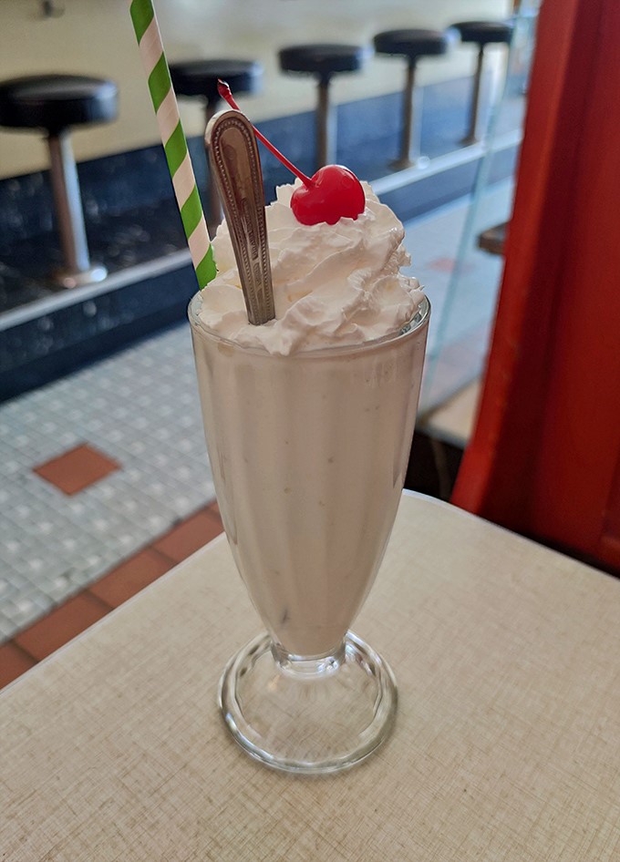 This isn't just a milkshake&mdash;it's a frothy time machine topped with whipped cream, a cherry, and a paper straw that actually works.
