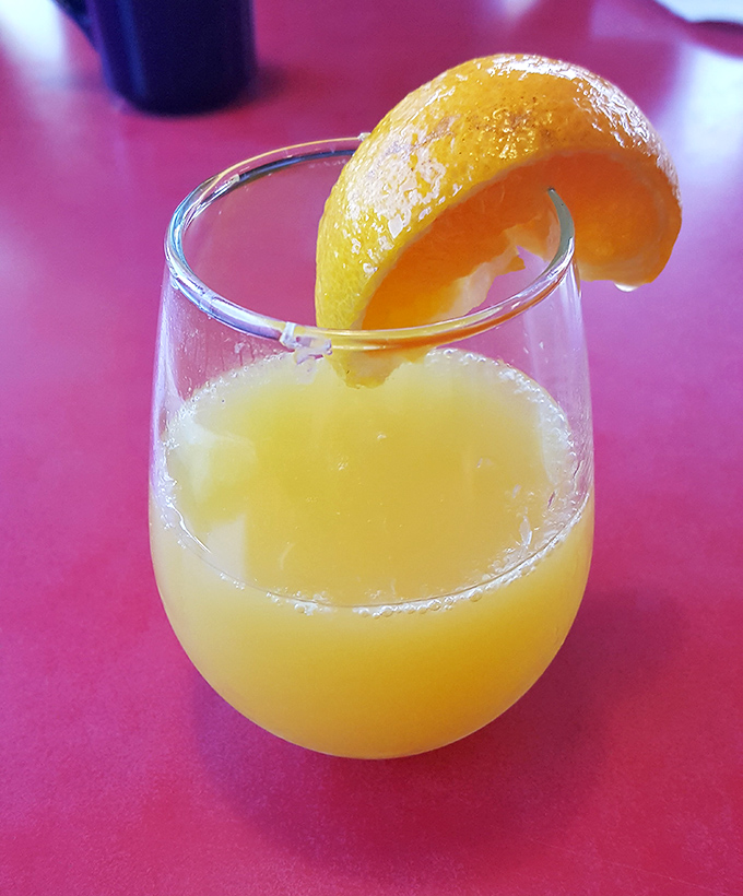 Morning mimosas sparkle with promise &ndash; liquid sunshine in a glass that whispers, "You're on vacation, even if you're not."