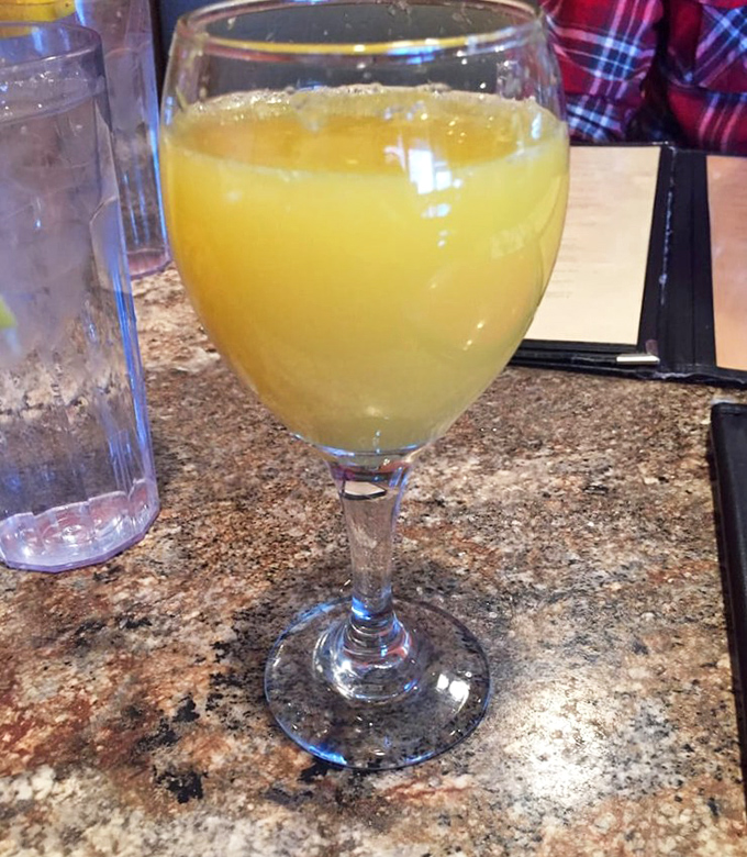 A mimosa this vibrant could brighten even a Monday morning. Sunshine in a glass, with just enough sparkle to make you feel fancy.