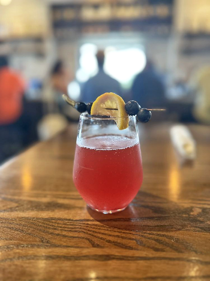 This isn't just a mimosa; it's morning optimism in a glass. The blueberry garnish is that little extra something you didn't know you needed.