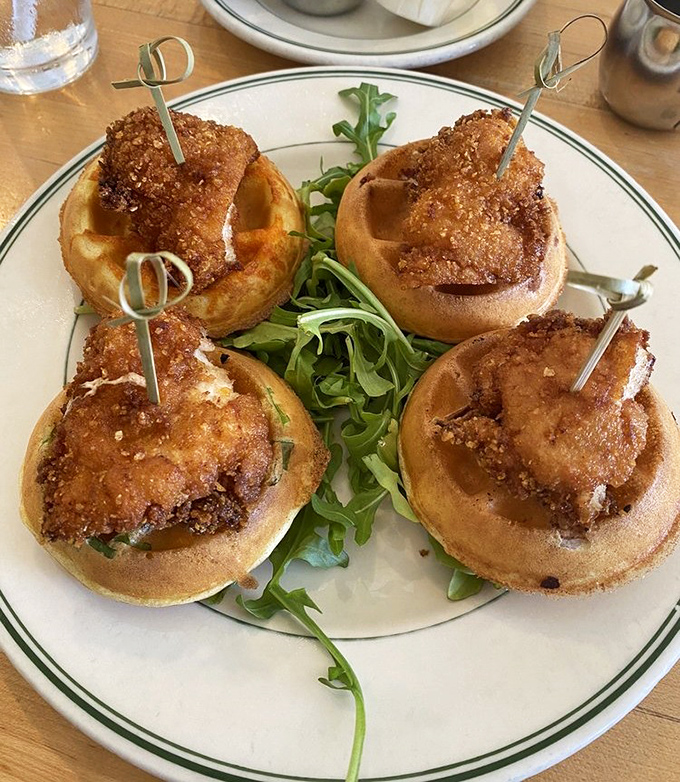Chicken and waffles reimagined as adorable sliders—because sometimes the best things come in small, crispy, maple-drizzled packages.