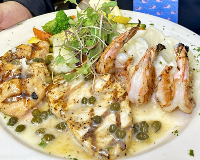 A seafood medley that's like the ocean's greatest hits album &ndash; each bite a different chart-topper, united by a buttery sauce worthy of applause.
