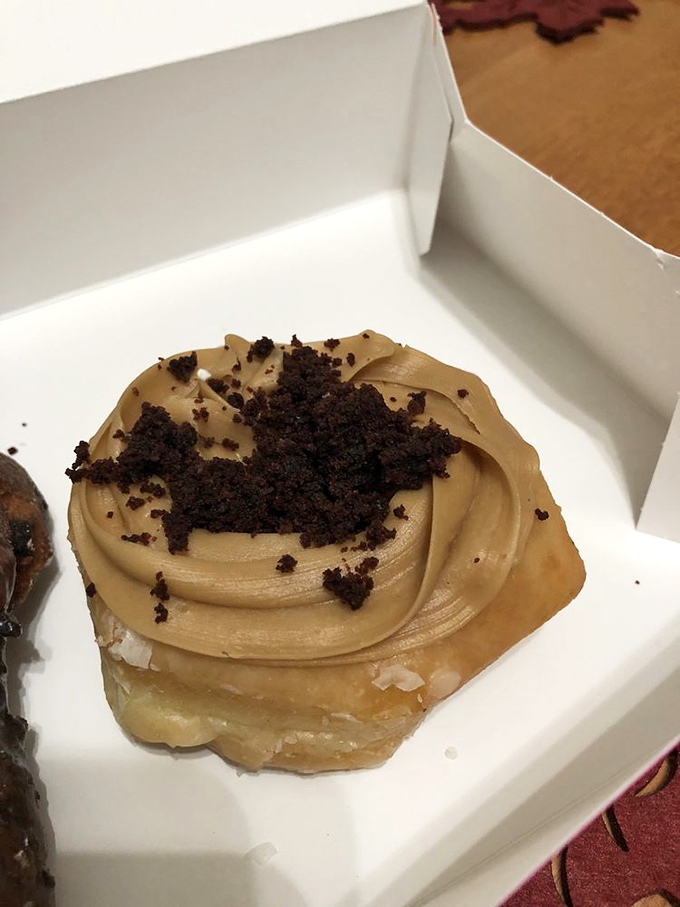 This chocolate-pecan masterpiece isn't just a donut&mdash;it's therapy with nuts. The perfect balance of crunch and softness in every bite.