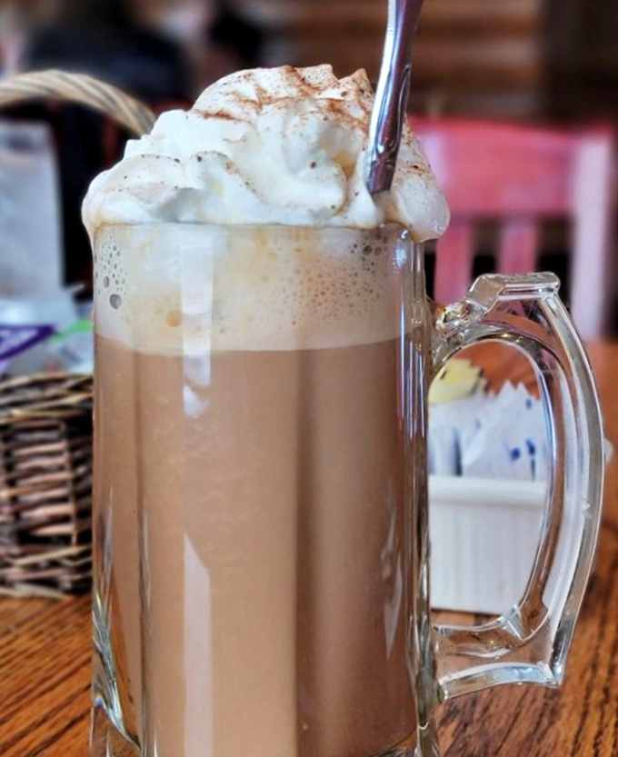 That mocha isn't just a drink &ndash; it's a frothy, whipped cream-topped mountain of morning motivation in a glass mug.