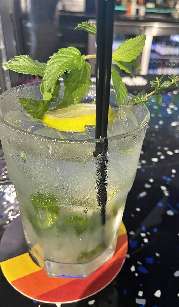 This isn't just a mojito &ndash; it's summer in a glass, with fresh mint leaves standing tall like tiny green flags of refreshment.