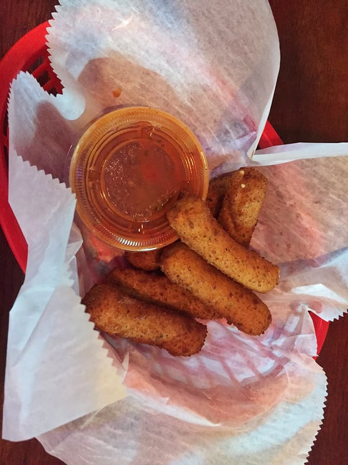 Golden-brown on the outside, molten cheese on the inside. These mozzarella sticks with marinara dipping sauce are the perfect prelude to wing paradise.