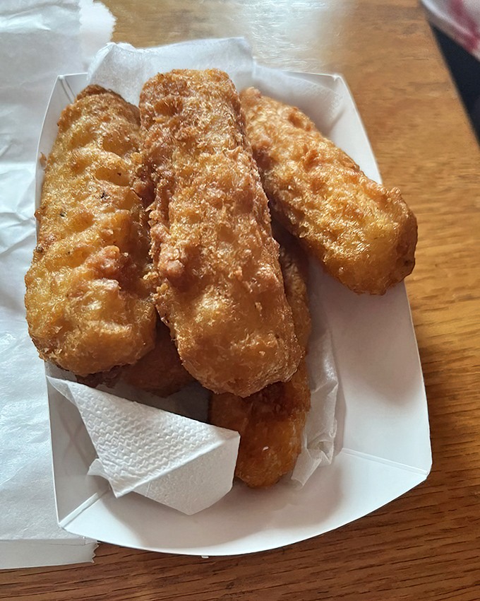 These aren't just mozzarella sticks&mdash;they're golden vessels of molten cheese joy, where the satisfying stretch between bite and plate becomes a measure of quality.