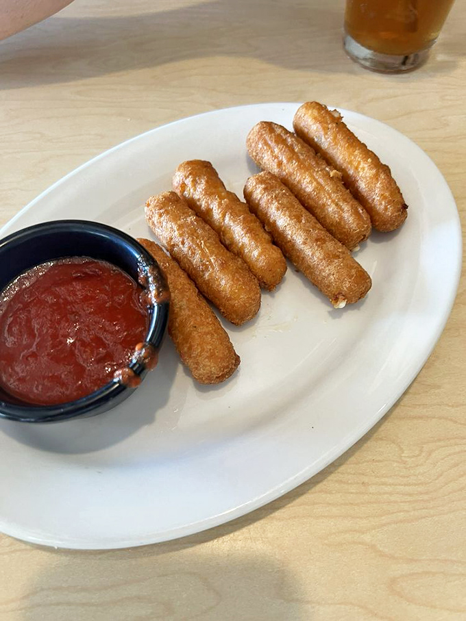Mozzarella sticks that achieve the perfect cheese-pull-to-crunch ratio&mdash;the kind that make you forget you're technically just eating fried cheese.