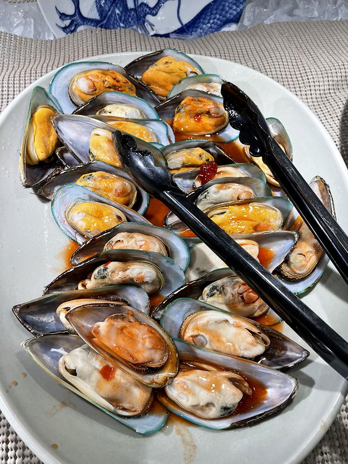 These glistening mussels look like they just waved goodbye to the ocean and said hello to perfection.
