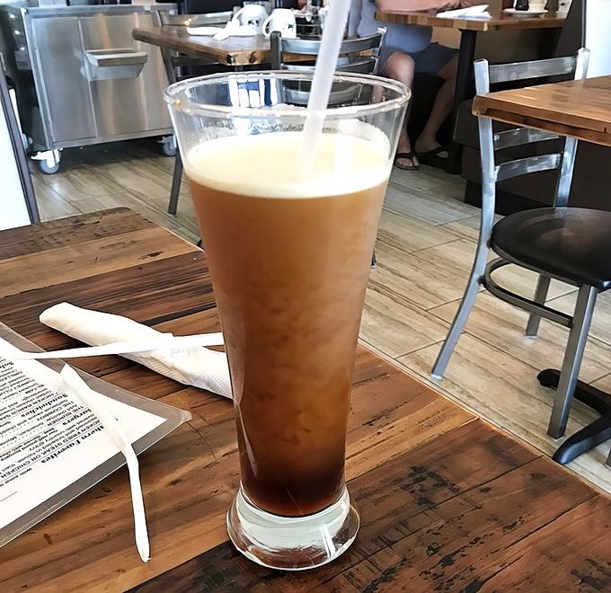 This isn't just coffee – it's nitro-infused liquid motivation in a glass, ready to transform morning zombies into functioning humans.