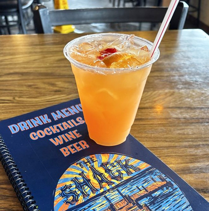 Sunshine in a glass: The Okaloosa Island Tea delivers tropical vibes with every sip, making even Tuesday feel like a Saturday getaway.