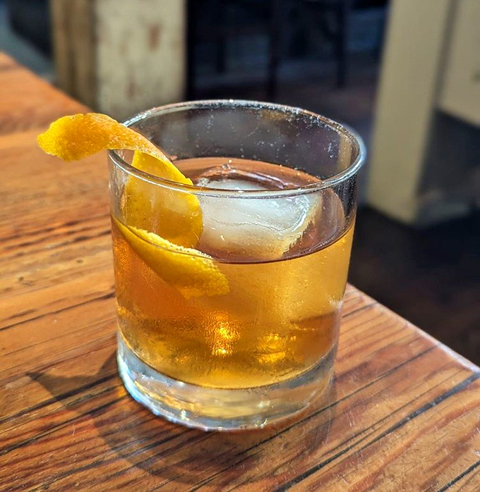 Cocktails arrive looking like they were designed by someone with an architecture degree and excellent taste in booze.