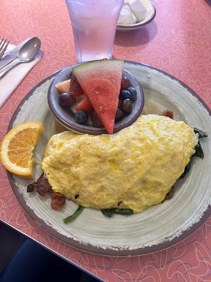 An omelet that's seen the inside of a properly hot pan. Perfectly folded around fresh fillings with fruit that actually tastes like fruit.