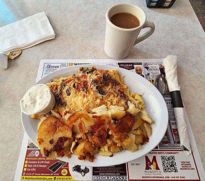 This omelet doesn't just contain ingredients&mdash;it embraces them. A fluffy egg blanket wrapped around a family of vegetables and cheese.