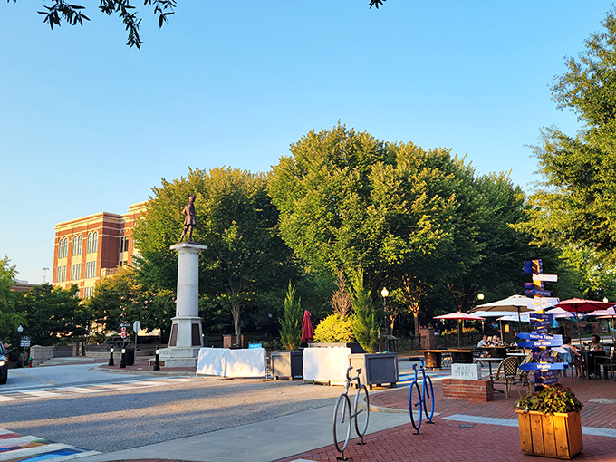 Morgan Square's historic statue stands sentinel as outdoor diners enjoy the kind of perfect evening that real estate agents feature in their "Why Spartanburg?" portfolios.