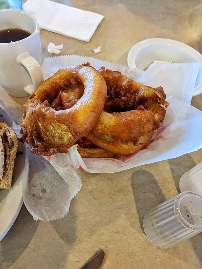 Golden, crispy onion rings that crackle with each bite. These aren't just side dishes&mdash;they're the supporting actors that steal the show.