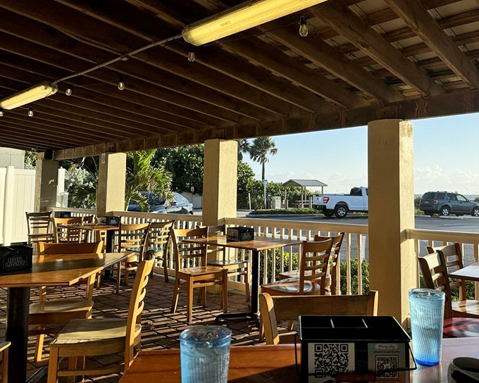 Outdoor seating that captures Florida's coastal charm – where ocean breezes complement your coffee and sunshine garnishes every plate.