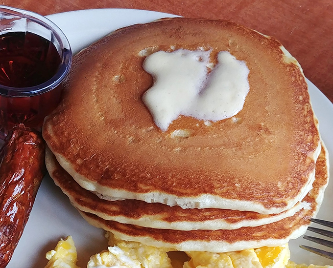 Golden pancakes that hit that perfect sweet spot—fluffy enough to impress, substantial enough to satisfy. Maple syrup's perfect dance partner.