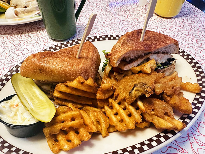 This sandwich isn't messing around&mdash;crispy bread, savory fillings, and those waffle fries deserve their own Connecticut postal code.