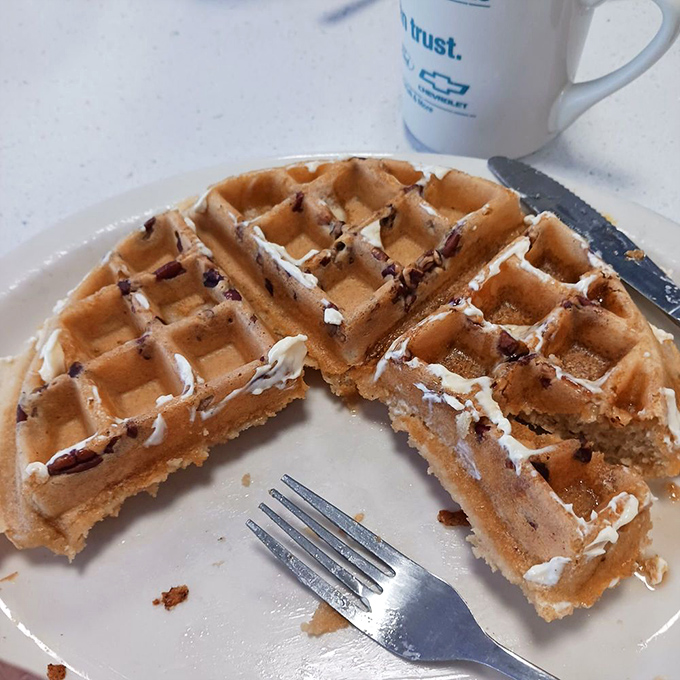 These pecan waffles aren't just breakfast, they're an architectural marvel of crispy exterior and fluffy interior, studded with nutty treasures.