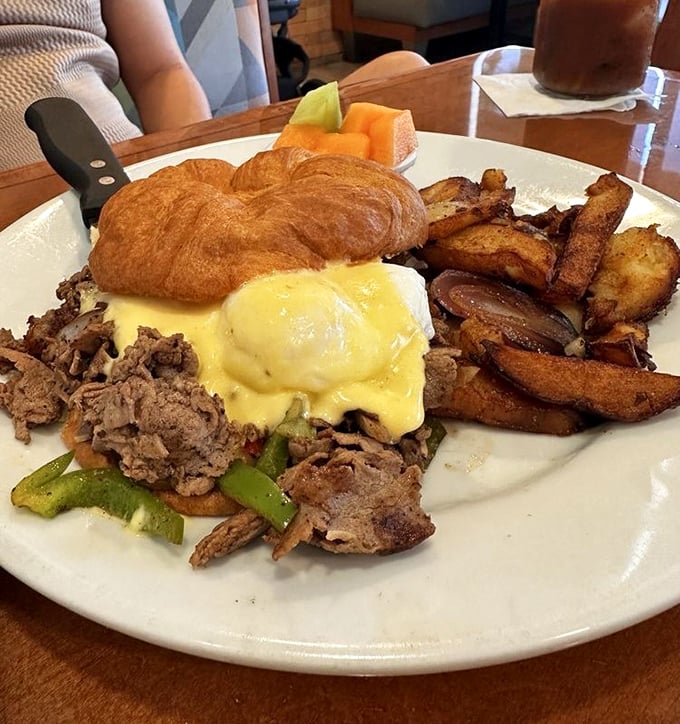 Breakfast architecture at its finest &ndash; a croissant Benedict featuring Philly steak that makes you wonder why you ever settled for plain English muffins.