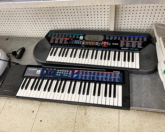 Two Casio keyboards sit side by side, patiently waiting for fingers to bring them back to life. Musical bargains for aspiring Beethovens.