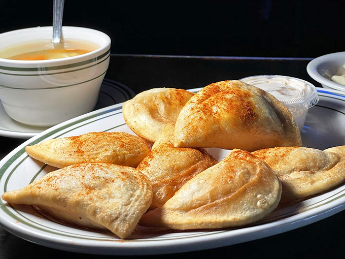 Pierogis dusted with paprika that look like little pillows of heaven. If clouds were made of dough and filled with potato, they'd taste like this.
