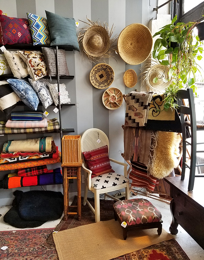 A bohemian dream corner where woven baskets meet vibrant textiles. Your living room called&mdash;it's feeling jealous and wants an upgrade.