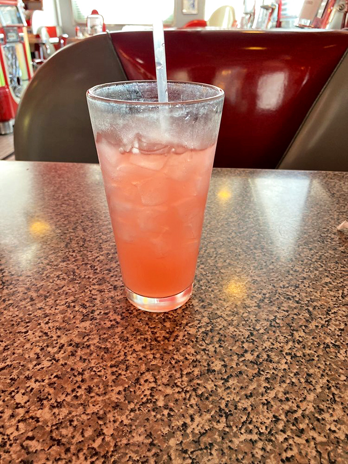 That pink lemonade isn't just a drink&mdash;it's summer in a glass, offering sweet-tart refreshment between bites of diner perfection.