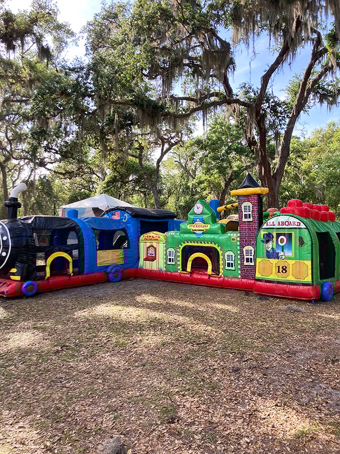 Even the playground embraces the train theme, with this bouncy locomotive castle letting kids burn off energy between rides.