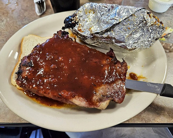 BBQ pork steak that's had a proper introduction to smoke and sauce &ndash; the kind of meat that makes vegetarians question their life choices.