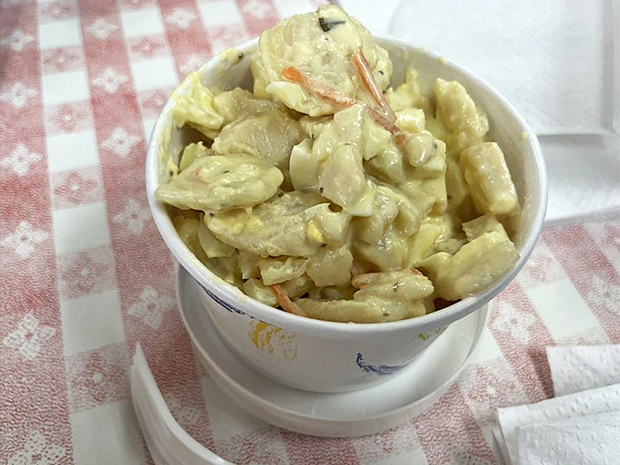Potato salad that looks like it came straight from a family reunion where three aunts secretly compete for the title of "Best Side Dish."