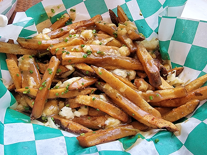 Poutine: where fries go to fulfill their destiny. These golden beauties swimming in gravy and cheese curds are Pennsylvania's answer to Canada.