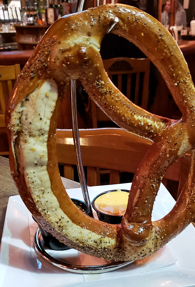 The pretzel that ate Manhattan. This glorious carb cathedral with dipping sauces is what bread dreams about at night.
