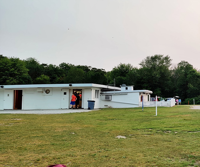 The concession building stands ready to fuel your double feature adventure with classic movie snacks and treats.