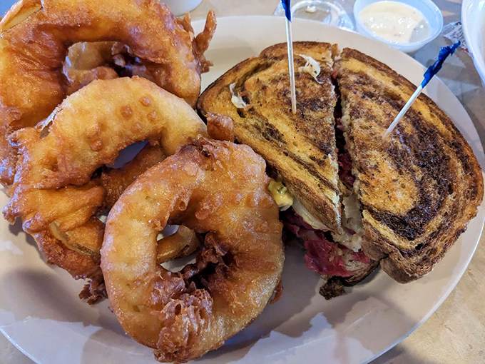Those onion rings aren't just side dishes&mdash;they're golden halos surrounding a sandwich that's earned its place in the comfort food hall of fame.