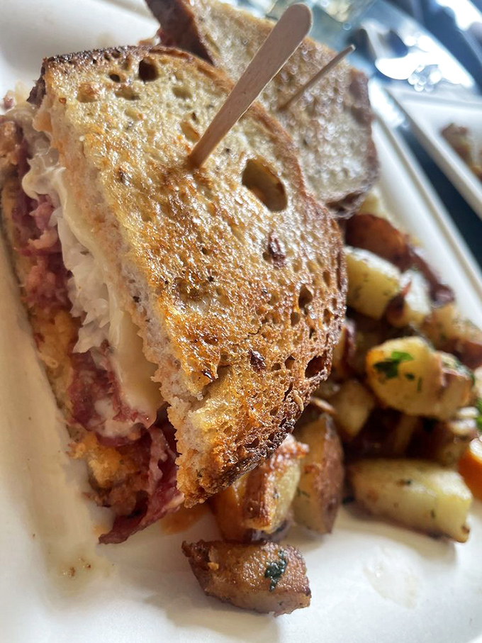 The Reuben sandwich—where bread, meat, and sauerkraut achieve perfect harmony. Like a deli orchestra conducted by someone who really gets you.