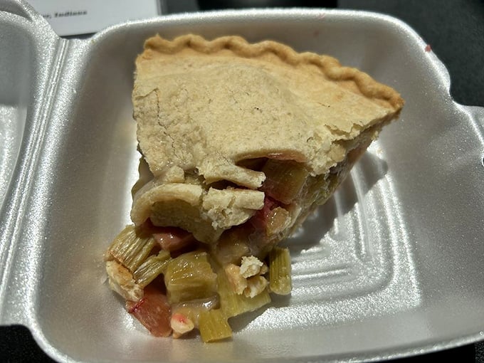 Rhubarb pie in its takeout container&mdash;proof that some of life's greatest pleasures are meant to be enjoyed at home in pajamas.