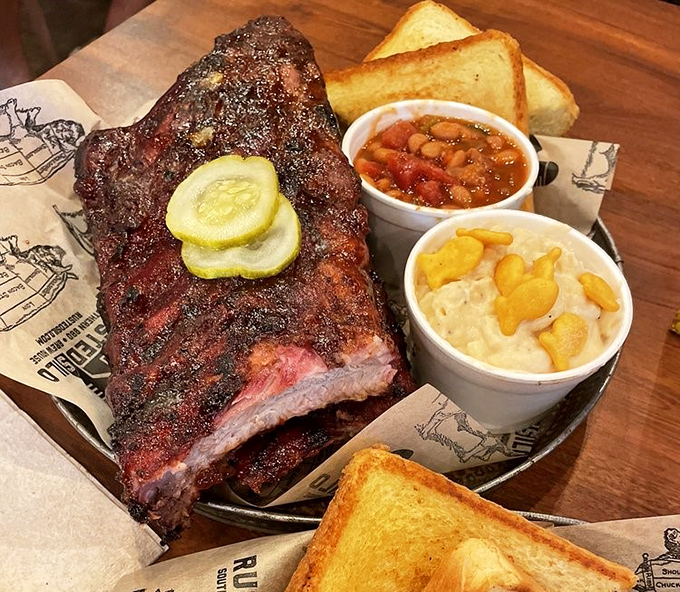 Ribs with the perfect bark-to-meat ratio, where the smoke ring isn't just visible&mdash;it's practically showing off for the camera.