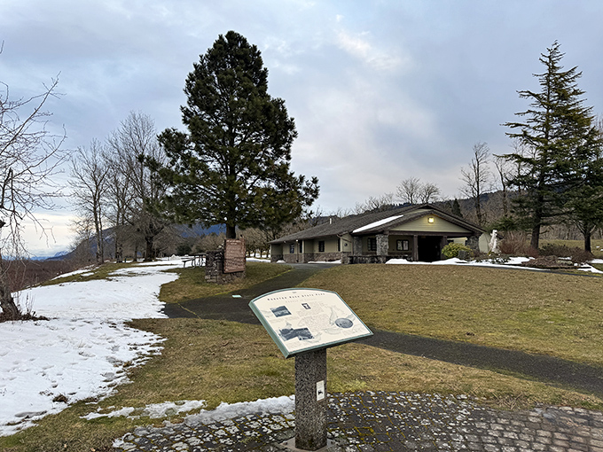 Winter transforms the visitor center into a postcard-worthy scene, where patches of snow create a peaceful contrast to the evergreen backdrop.