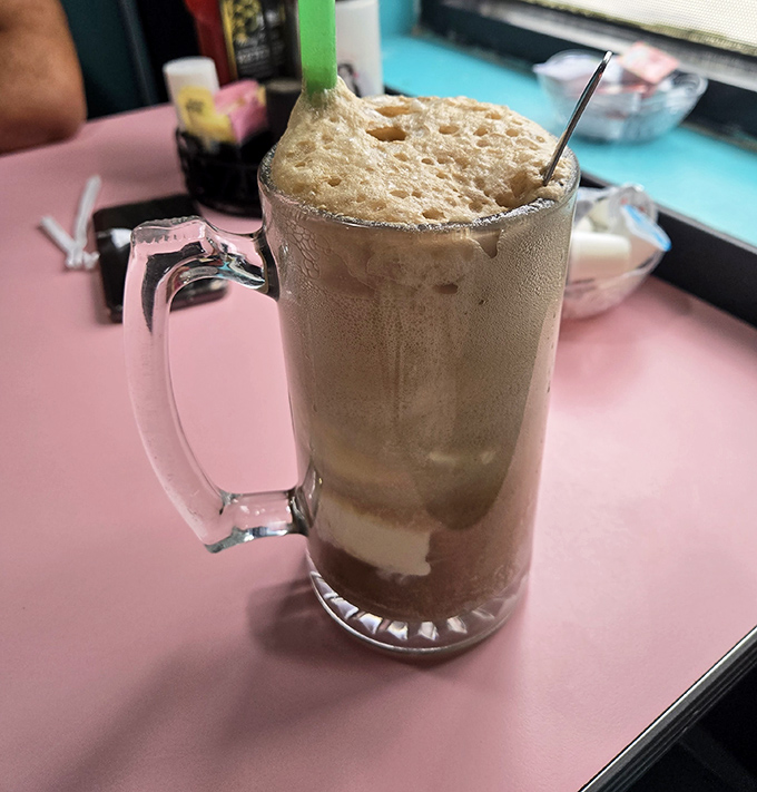 Root beer float in a frosty mug&mdash;where childhood nostalgia meets adult-sized portions. The foam alone deserves its own Instagram account.