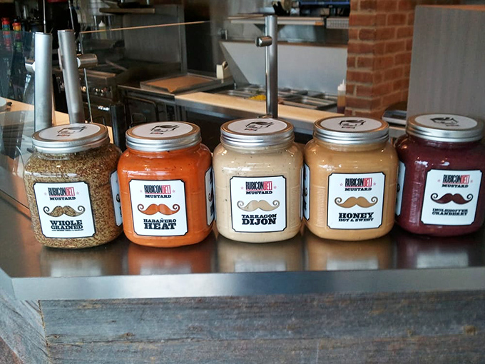 The secret weapons behind Rubicon's flavor arsenal. These house-made condiments transform good sandwiches into life-changing experiences.