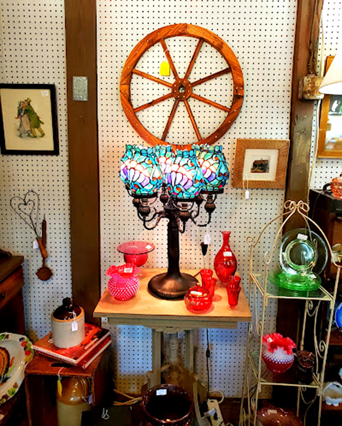 That Tiffany-style lamp casts the kind of glow that makes everything look better&mdash;including your decision to buy that wagon wheel.