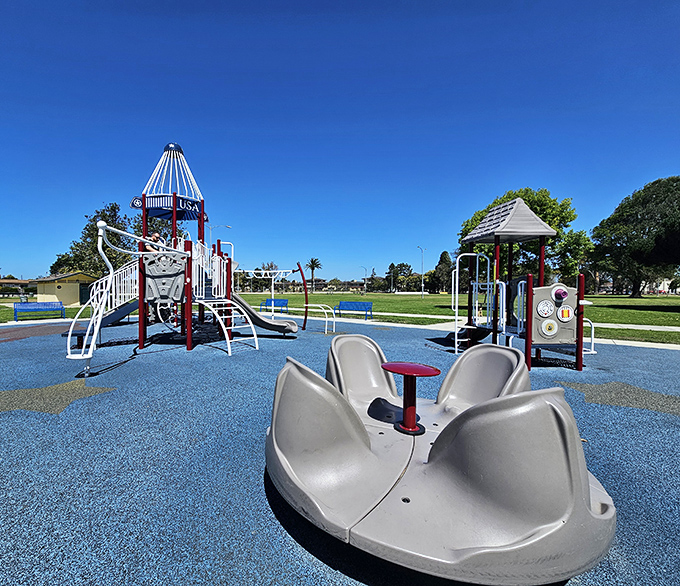 A playground where the equipment is modern but the concept is delightfully old-school: kids actually playing outside instead of staring at screens.